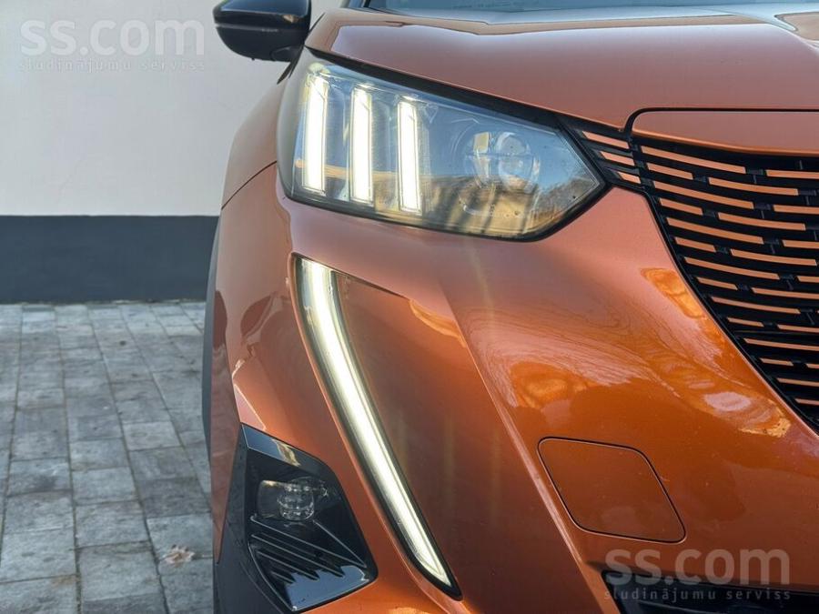 Orange Peugeot 2008 2021 in Riga, with an engine capacity of 0.00 L and mileage of 73 thousand km for 17999 €, photo 10 on AUTOMOTO.COM.LV