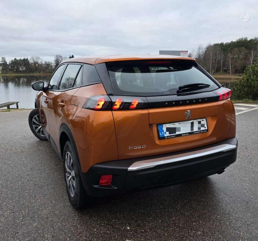 Orange Peugeot 2008 2021 in Utena, with an engine capacity of 1.20 L and mileage of 38 thousand km for 11700 €, photo 4 on AUTOMOTO.COM.LV