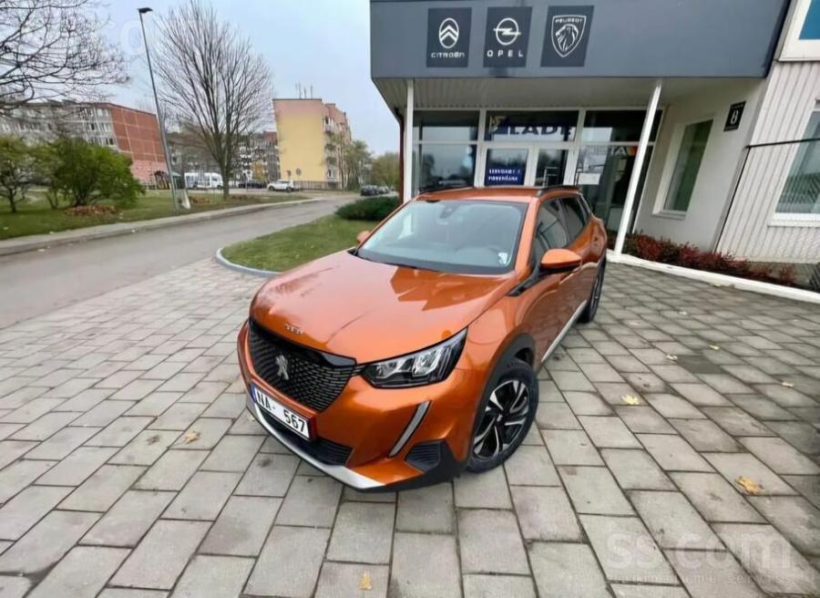 Orange Peugeot 2008 2021 in Liepaja, with an engine capacity of 1.20 L and mileage of 49 thousand km for 13990 €, photo 1 on AUTOMOTO.COM.LV