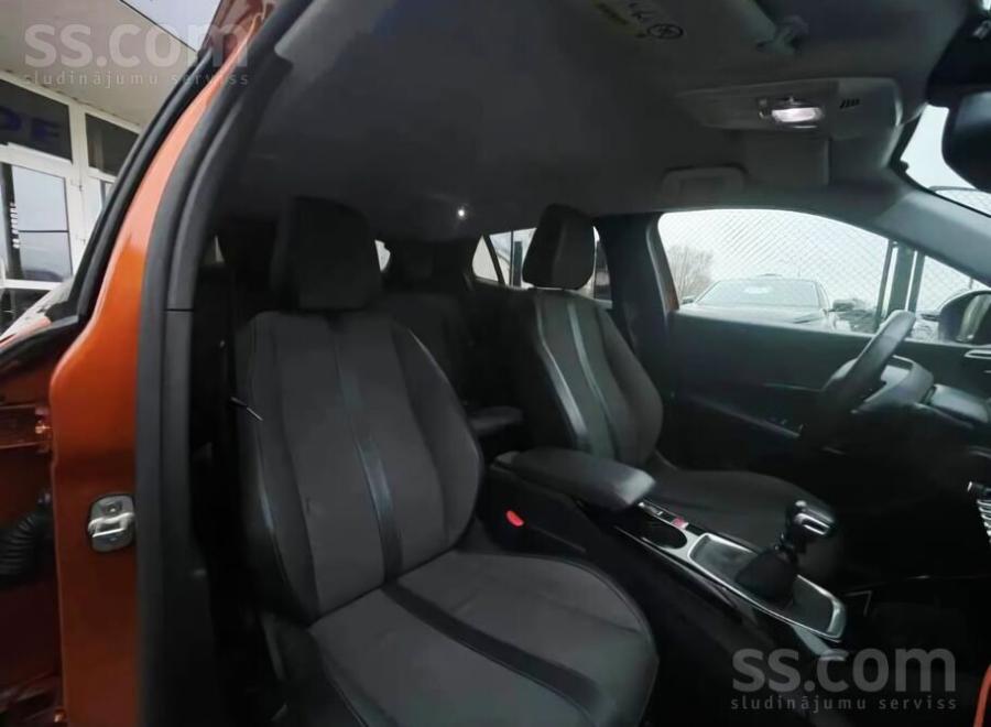 Orange Peugeot 2008 2021 in Liepaja, with an engine capacity of 1.20 L and mileage of 49 thousand km for 13990 €, photo 5 on AUTOMOTO.COM.LV