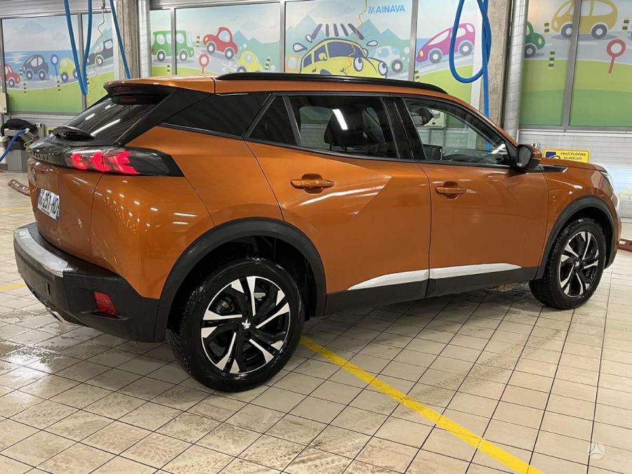 Orange Peugeot 2008 2021 in Vilnius, with an engine capacity of 1.20 L and mileage of 193 thousand km for 12040 €, photo 6 on AUTOMOTO.COM.LV