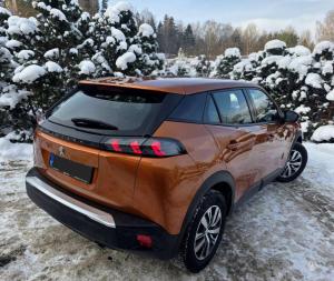 Orange Peugeot 2008 2021 in Utena, with an engine capacity of 1.20 L and mileage of 39 thousand km for 12900 €, photo 4 on AUTOMOTO.COM.LV