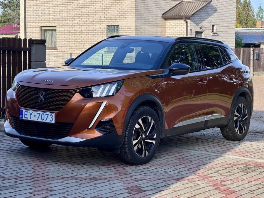 Oranžs Peugeot 2008 2021 Jelgava, ar dzinēja tilpumu 1.20 L un nobraukumu 137 tūkst. km par 14000 €, foto 8 vietnē AUTOMOTO.COM.LV