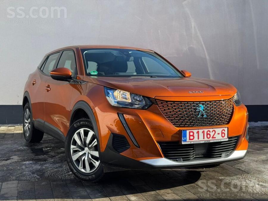 Orange Peugeot 2008 2021 in Riga, with an engine capacity of 1.20 L and mileage of 44 thousand km for 14999 €, photo 4 on AUTOMOTO.COM.LV