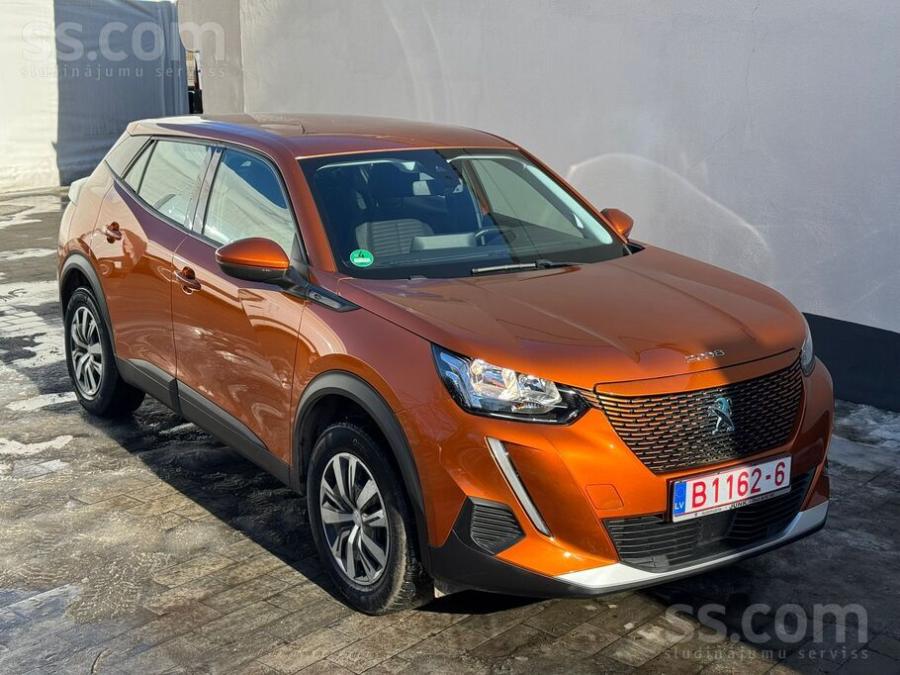Orange Peugeot 2008 2021 in Riga, with an engine capacity of 1.20 L and mileage of 44 thousand km for 14999 €, photo 5 on AUTOMOTO.COM.LV