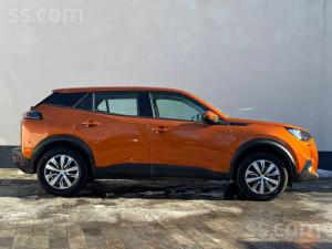 Orange Peugeot 2008 2021 in Riga, with an engine capacity of 1.20 L and mileage of 44 thousand km for 14999 €, photo 6 on AUTOMOTO.COM.LV