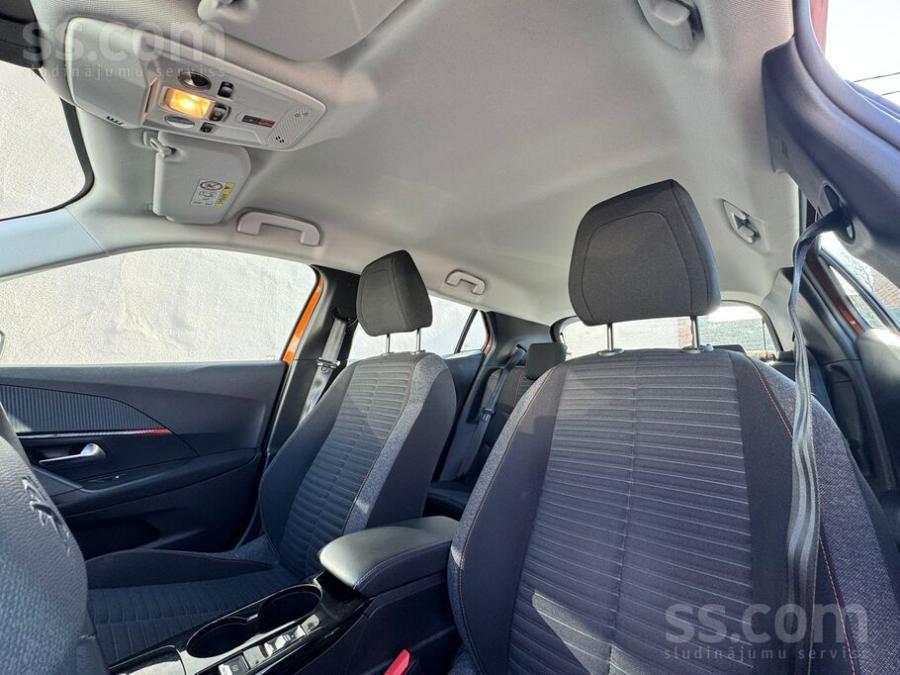 Orange Peugeot 2008 2021 in Riga, with an engine capacity of 1.20 L and mileage of 44 thousand km for 14999 €, photo 13 on AUTOMOTO.COM.LV