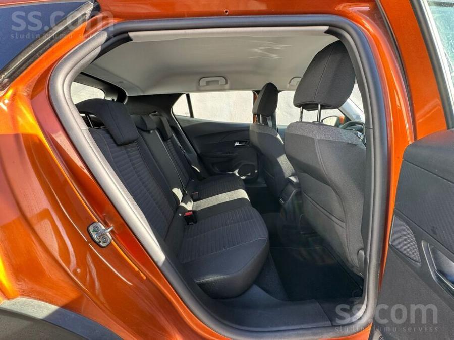 Orange Peugeot 2008 2021 in Riga, with an engine capacity of 1.20 L and mileage of 44 thousand km for 14999 €, photo 17 on AUTOMOTO.COM.LV