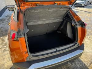 Orange Peugeot 2008 2021 in Riga, with an engine capacity of 1.20 L and mileage of 44 thousand km for 14999 €, photo 21 on AUTOMOTO.COM.LV