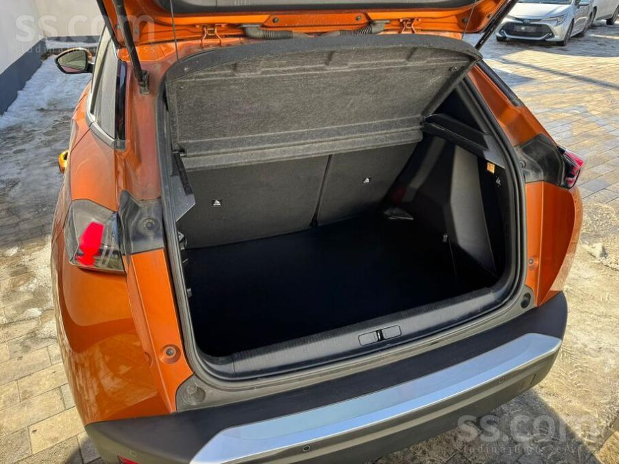 Orange Peugeot 2008 2021 in Riga, with an engine capacity of 1.20 L and mileage of 44 thousand km for 14999 €, photo 21 on AUTOMOTO.COM.LV