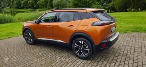 Orange Peugeot 2008 2021 in Vilnius, with an engine capacity of 1.50 L and mileage of 63 thousand km for 15555 €, photo  on AUTOMOTO.COM.LV