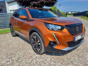 Orange Peugeot 2008 2021 in Alytus, with an engine capacity of 1.20 L and mileage of 59 thousand km for 9900 €, photo  on AUTOMOTO.COM.LV
