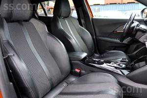 Orange Peugeot 2008 2021 in Riga, with an engine capacity of 1.50 L and mileage of 112 thousand km for 14490 €, photo 20 on AUTOMOTO.COM.LV