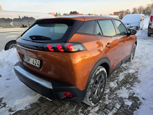Orange Peugeot 2008 2022 in Klaipeda, with an engine capacity of 1.20 L and mileage of 69 thousand km for 16900 €, photo 4 on AUTOMOTO.COM.LV