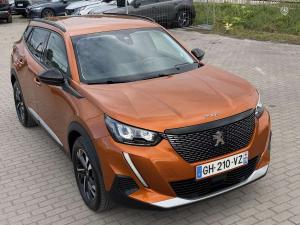 Orange Peugeot 2008 2022 in Marijampole, with an engine capacity of 1.20 L and mileage of 63 thousand km for 13552 €, photo 7 on AUTOMOTO.COM.LV
