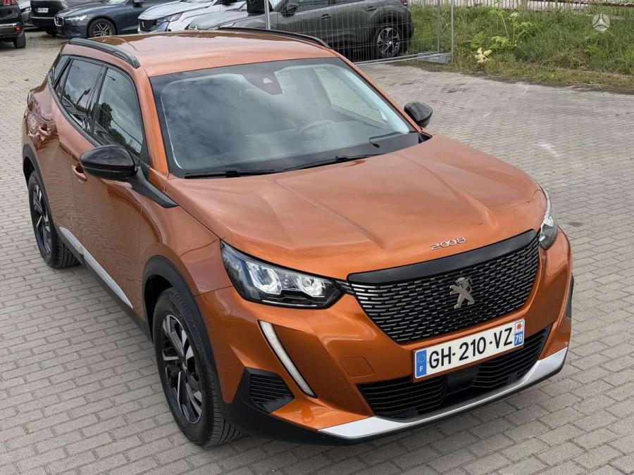 Orange Peugeot 2008 2022 in Marijampole, with an engine capacity of 1.20 L and mileage of 63 thousand km for 13552 €, photo 7 on AUTOMOTO.COM.LV
