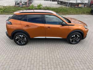 Orange Peugeot 2008 2022 in Marijampole, with an engine capacity of 1.20 L and mileage of 63 thousand km for 13552 €, photo 9 on AUTOMOTO.COM.LV