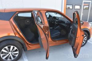 Orange Peugeot 2008 2022 in Riga, with an engine capacity of 1.20 L and mileage of 31 thousand km for 19990 €, photo 8 on AUTOMOTO.COM.LV