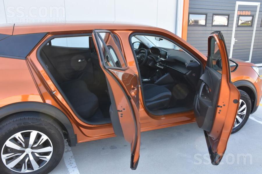 Orange Peugeot 2008 2022 in Riga, with an engine capacity of 1.20 L and mileage of 31 thousand km for 19990 €, photo 8 on AUTOMOTO.COM.LV
