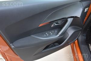 Orange Peugeot 2008 2022 in Riga, with an engine capacity of 1.20 L and mileage of 31 thousand km for 19990 €, photo 11 on AUTOMOTO.COM.LV