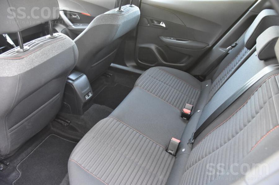Orange Peugeot 2008 2022 in Riga, with an engine capacity of 1.20 L and mileage of 31 thousand km for 19990 €, photo 12 on AUTOMOTO.COM.LV