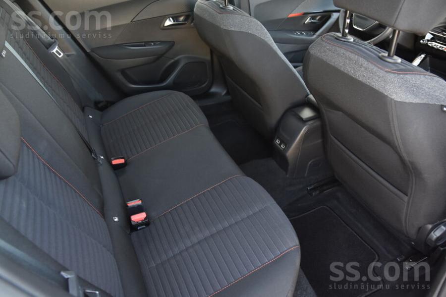 Orange Peugeot 2008 2022 in Riga, with an engine capacity of 1.20 L and mileage of 31 thousand km for 19990 €, photo 14 on AUTOMOTO.COM.LV