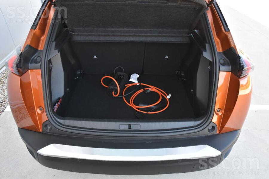 Orange Peugeot 2008 2022 in Riga, with an engine capacity of 1.20 L and mileage of 31 thousand km for 19990 €, photo 16 on AUTOMOTO.COM.LV