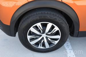 Orange Peugeot 2008 2022 in Riga, with an engine capacity of 1.20 L and mileage of 31 thousand km for 19990 €, photo 30 on AUTOMOTO.COM.LV