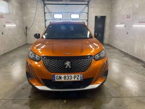 Orange Peugeot 2008 2023 in Marijampole, with an engine capacity of 1.20 L and mileage of 138 thousand km for 13189 €, photo 3 on AUTOMOTO.COM.LV