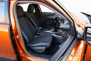 Orange Peugeot 2008 2020 in Riga, with an engine capacity of 1.20 L and mileage of 43 thousand km for 14250 €, photo 7 on AUTOMOTO.COM.LV