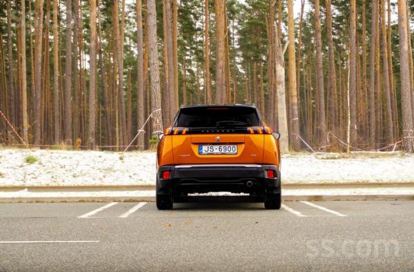 Orange Peugeot 2008 2022 in Riga, with an engine capacity of 1.50 L and mileage of 57 thousand km for 18190 €, photo 4 on AUTOMOTO.COM.LV