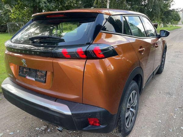Orange Peugeot 2008 2021 in Taurage, with an engine capacity of 1.20 L and mileage of 82 thousand km for 6900 €, photo 4 on AUTOMOTO.COM.LV