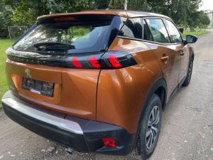 Oranžs Peugeot 2008 2021 Tauragė, ar dzinēja tilpumu 1.20 L un nobraukumu 82 tūkst. km par 6900 €, foto 4 vietnē AUTOMOTO.COM.LV