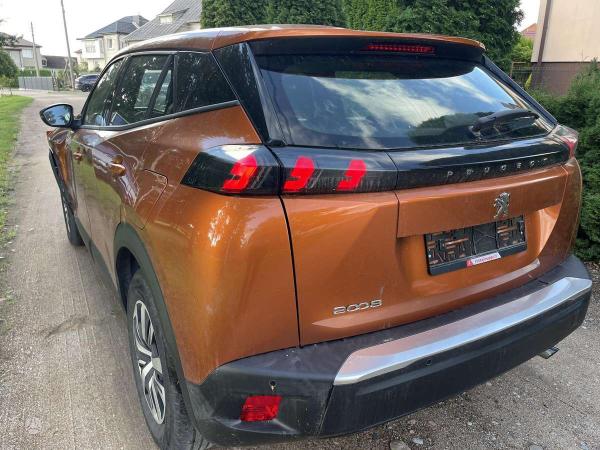 Orange Peugeot 2008 2021 in Taurage, with an engine capacity of 1.20 L and mileage of 82 thousand km for 6900 €, photo 5 on AUTOMOTO.COM.LV