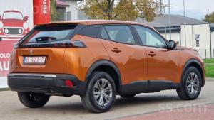 Orange Peugeot 2008 2020 in Jelgava, with an engine capacity of 1.20 L and mileage of 100 thousand km for 11250 €, photo 4 on AUTOMOTO.COM.LV