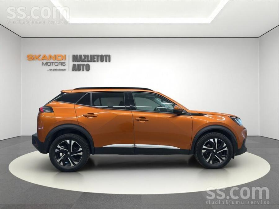 Orange Peugeot 2008 2021 in Riga, with an engine capacity of 1.50 L and mileage of 102 thousand km for 13990 €, photo 8 on AUTOMOTO.COM.LV