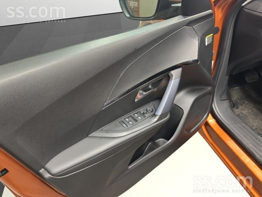 Orange Peugeot 2008 2021 in Riga, with an engine capacity of 1.50 L and mileage of 102 thousand km for 13990 €, photo 13 on AUTOMOTO.COM.LV