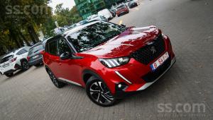 Red Peugeot 2008 2020 in Riga, with an engine capacity of 1.20 L and mileage of 113 thousand km for 13950 €, photo 5 on AUTOMOTO.COM.LV
