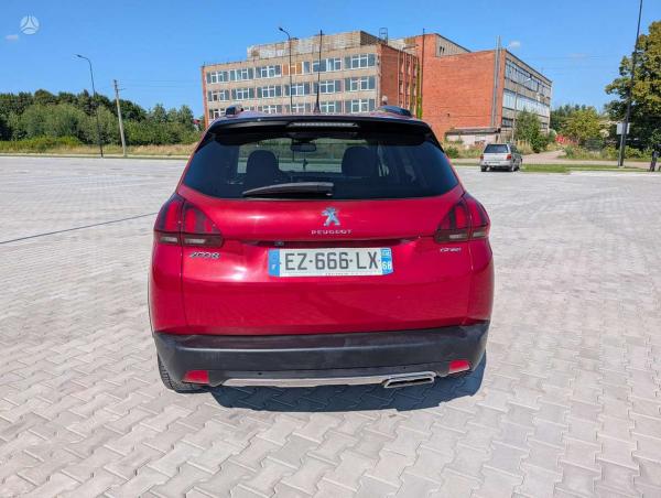 Sarkans Peugeot 2008 2018 Tauragė, ar dzinēja tilpumu 1.20 L un nobraukumu 137 tūkst. km par 5500 €, foto 4 vietnē AUTOMOTO.COM.LV