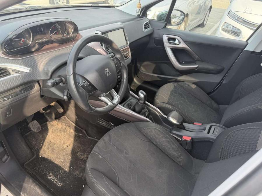 Balts Peugeot 2008 2015 Tauragė, ar dzinēja tilpumu 1.20 L un nobraukumu 155 tūkst. km par 3500 €, foto 9 vietnē AUTOMOTO.COM.LV