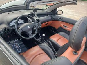 Black Peugeot 206 2003 in Kelme, with an engine capacity of 2.00 L and mileage of 162 thousand km for 2000 €, photo 8 on AUTOMOTO.COM.LV