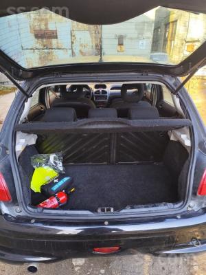 Melns Peugeot 206 2006 Rīga, ar dzinēja tilpumu 1.40 L un nobraukumu 190 tūkst. km par 1200 €, foto 4 vietnē AUTOMOTO.COM.LV