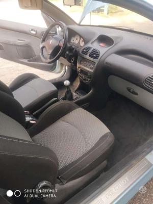 Blue Peugeot 206 2002 in Kaunas, with an engine capacity of 1.59 L and mileage of 227 thousand km for 1200 €, photo 13 on AUTOMOTO.COM.LV
