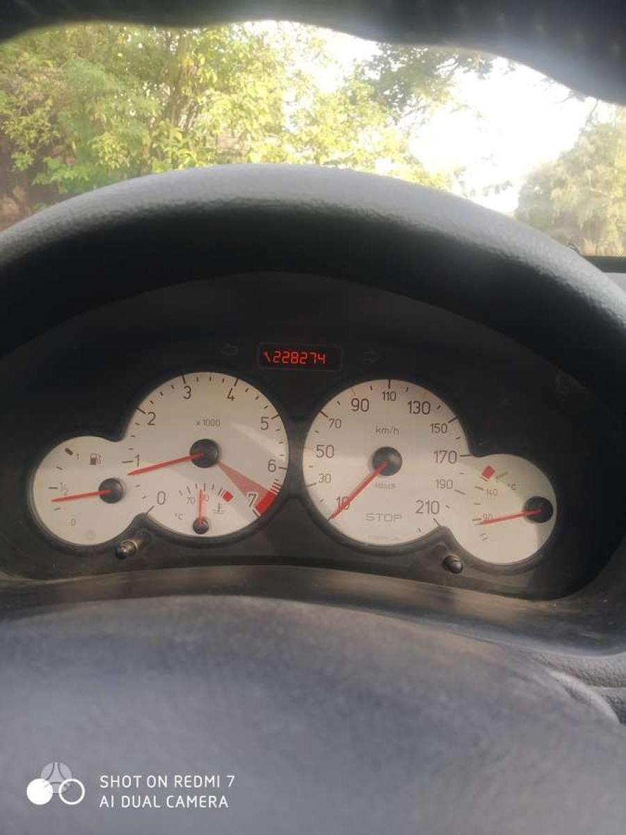 Blue Peugeot 206 2002 in Kaunas, with an engine capacity of 1.59 L and mileage of 227 thousand km for 1200 €, photo 16 on AUTOMOTO.COM.LV