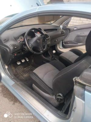 Blue Peugeot 206 2002 in Kaunas, with an engine capacity of 1.59 L and mileage of 227 thousand km for 1200 €, photo 18 on AUTOMOTO.COM.LV