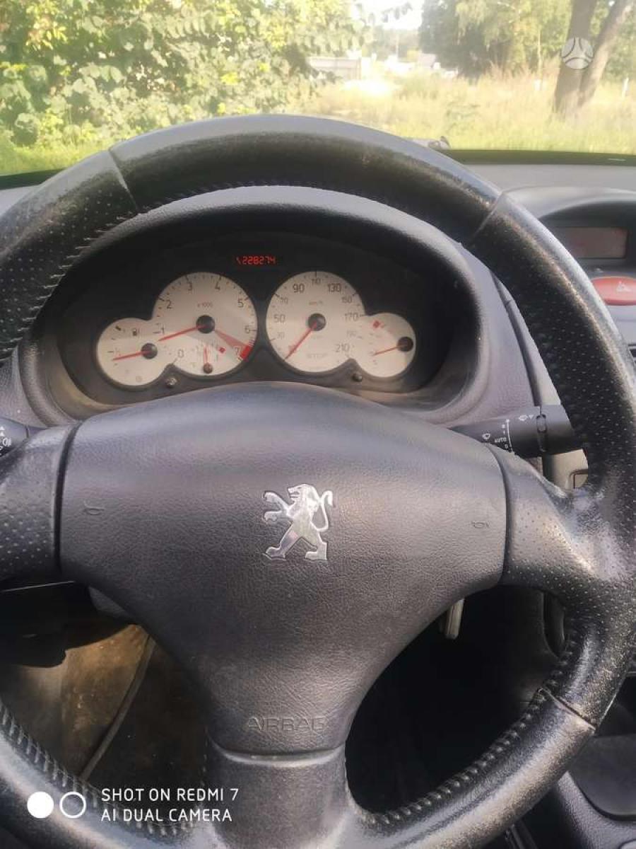 Blue Peugeot 206 2002 in Kaunas, with an engine capacity of 1.59 L and mileage of 227 thousand km for 1200 €, photo 19 on AUTOMOTO.COM.LV