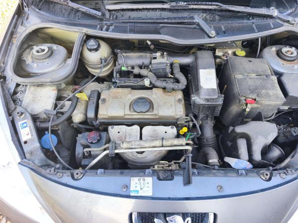 Grey Peugeot 206 2009 in Vilnius, with an engine capacity of 1.40 L and mileage of 210 thousand km for 1099 €, photo 8 on AUTOMOTO.COM.LV