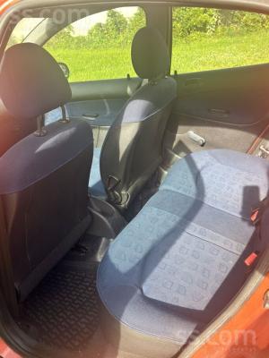 Orange Peugeot 206 2001 in Riga, with an engine capacity of 1.40 L and mileage of 164 thousand km for 950 €, photo 8 on AUTOMOTO.COM.LV