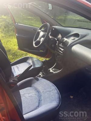 Orange Peugeot 206 2001 in Riga, with an engine capacity of 1.40 L and mileage of 164 thousand km for 950 €, photo 9 on AUTOMOTO.COM.LV