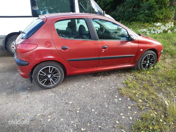 Red Peugeot 206 2002 in Voru, with an engine capacity of 44.00 L and mileage of 128 thousand km for 1800 €, photo 5 on AUTOMOTO.COM.LV